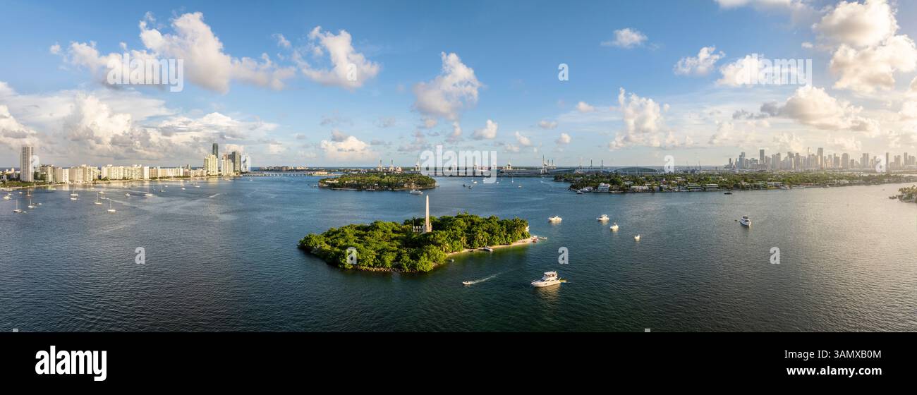 Aerial view of monument island surrounded by biscayne bay and skyline ...