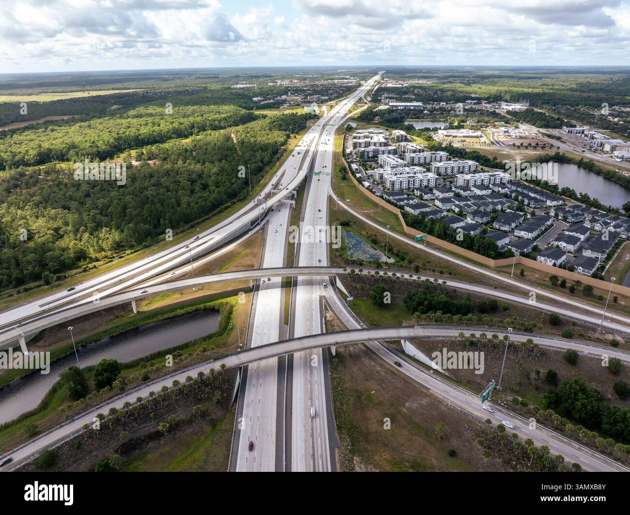 Aerial view of Turbine Interchange with highway, buildings, and trees ...