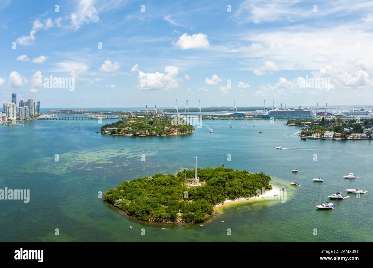 Aerial view of monument island in biscayne bay with luxury boats and ...