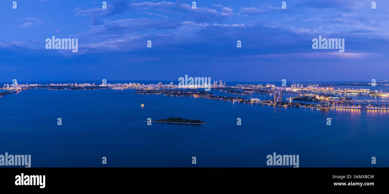 Aerial view of Miami skyline at night with Biscayne Bay, Edgewater ...