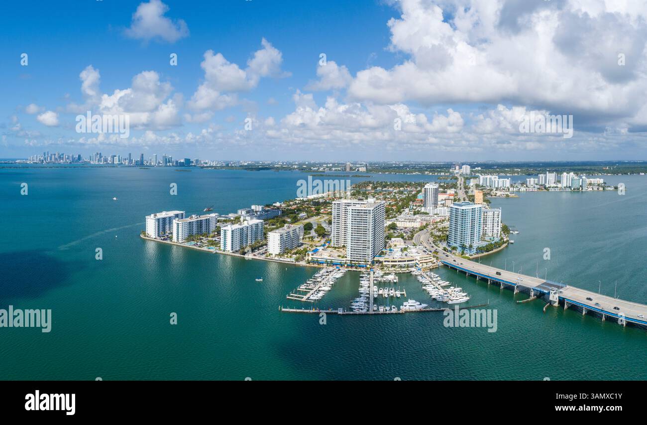 Aerial view of sandy beach and skyscrapers along the coast, North Bay ...