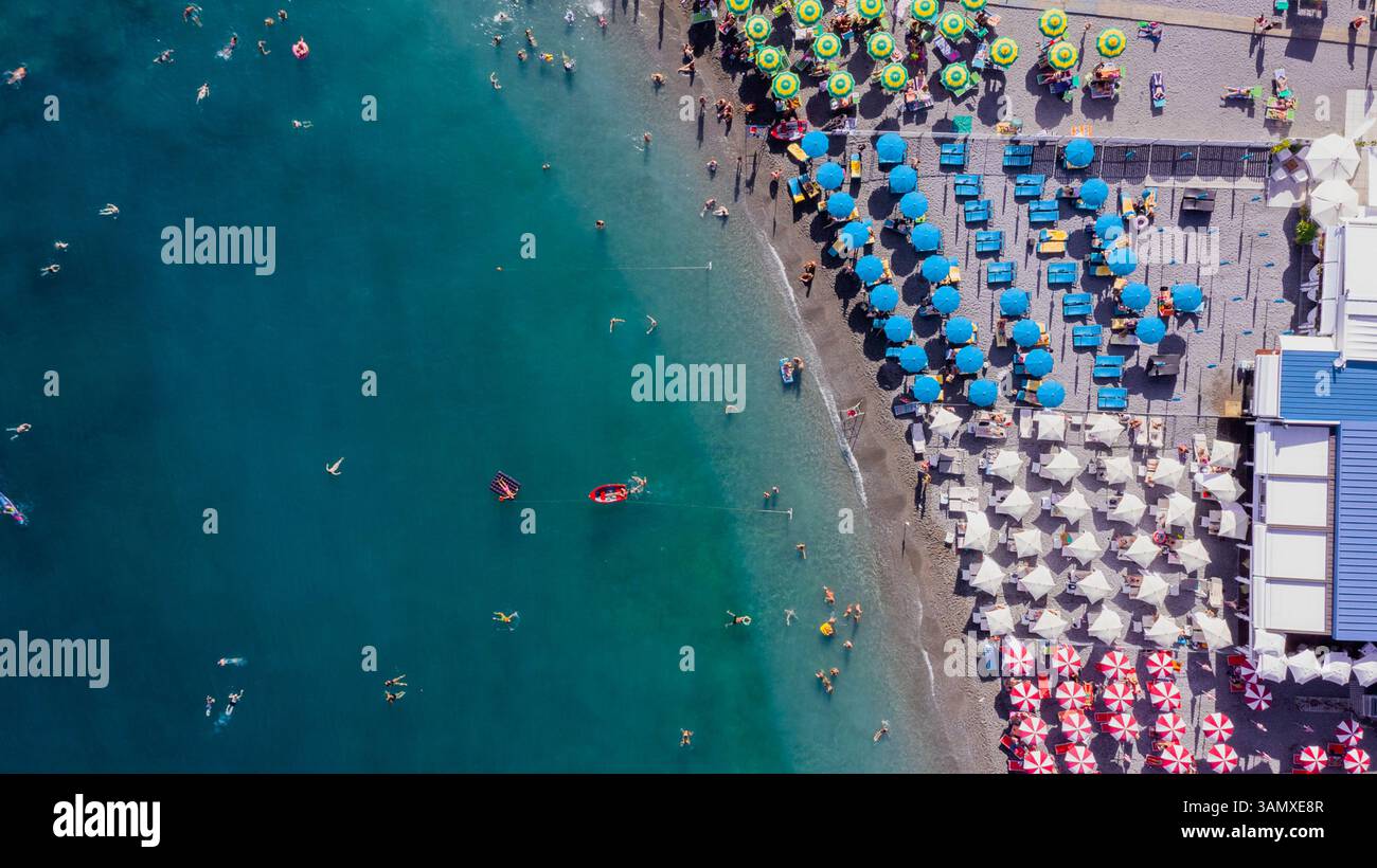 Aerial view of a touristic beach at Positano during the summer ...