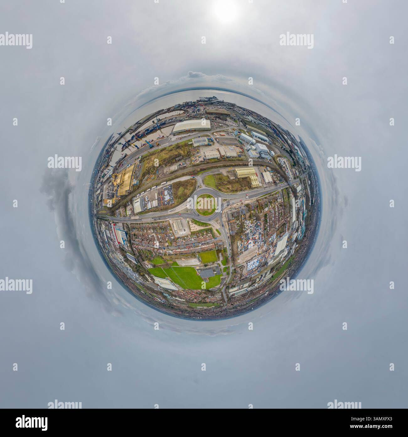 Aerial view of a tiny planet scene featuring a roundabout surrounded by ...