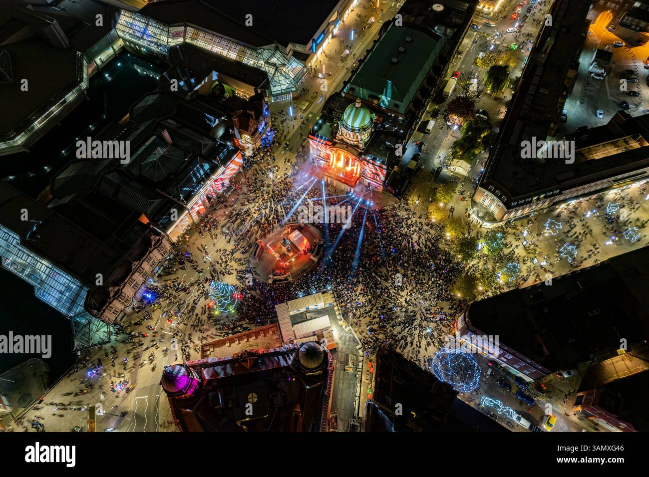 High aerial view of crowds gathering to watch the Christmas light in ...