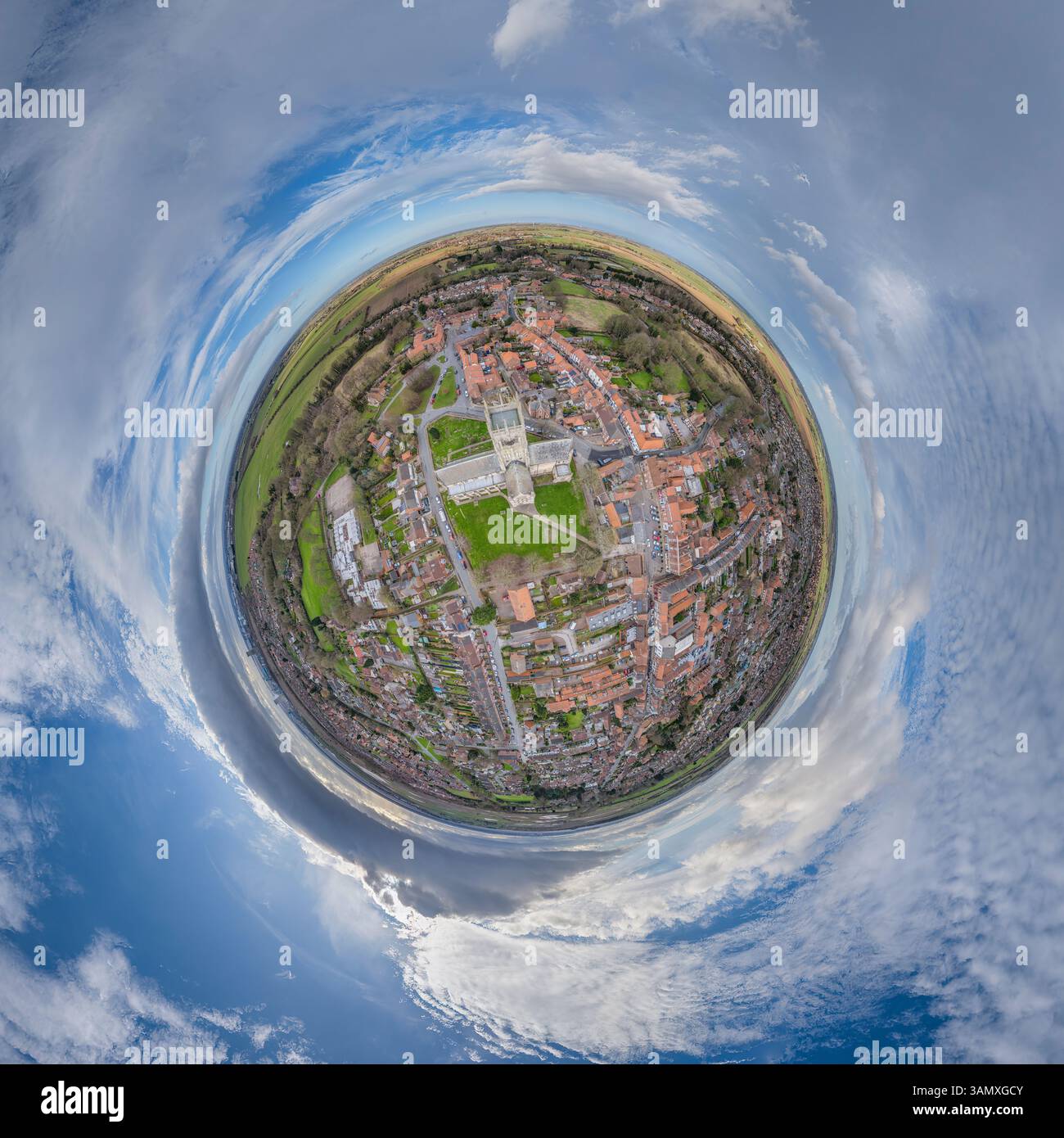 Aerial view of tiny planet cityscape with historic buildings and scenic ...