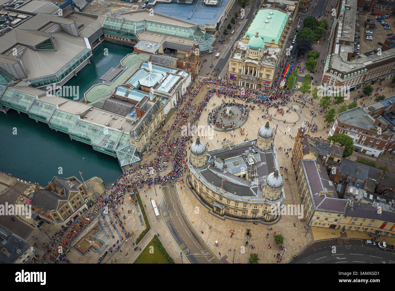 Aerial view of gay pride parade with people in Victoria Queen square of ...