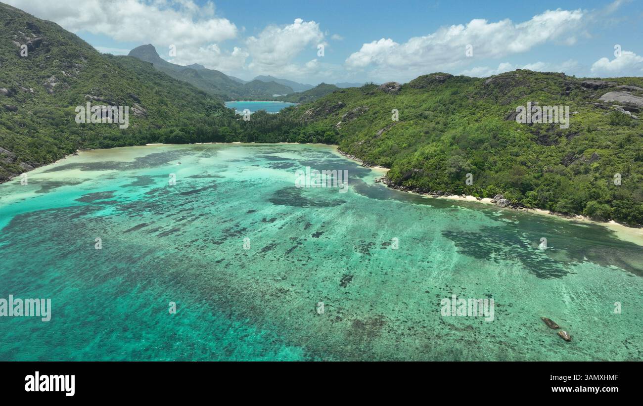 Aerial view of the coral reef in Baie Ternay Marine National Park, Mahé ...