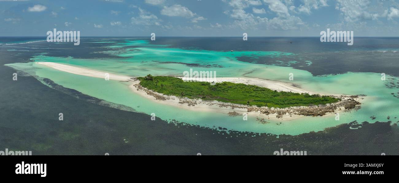 Aerial view of turquoise waters surrounding African Banks, coral island ...