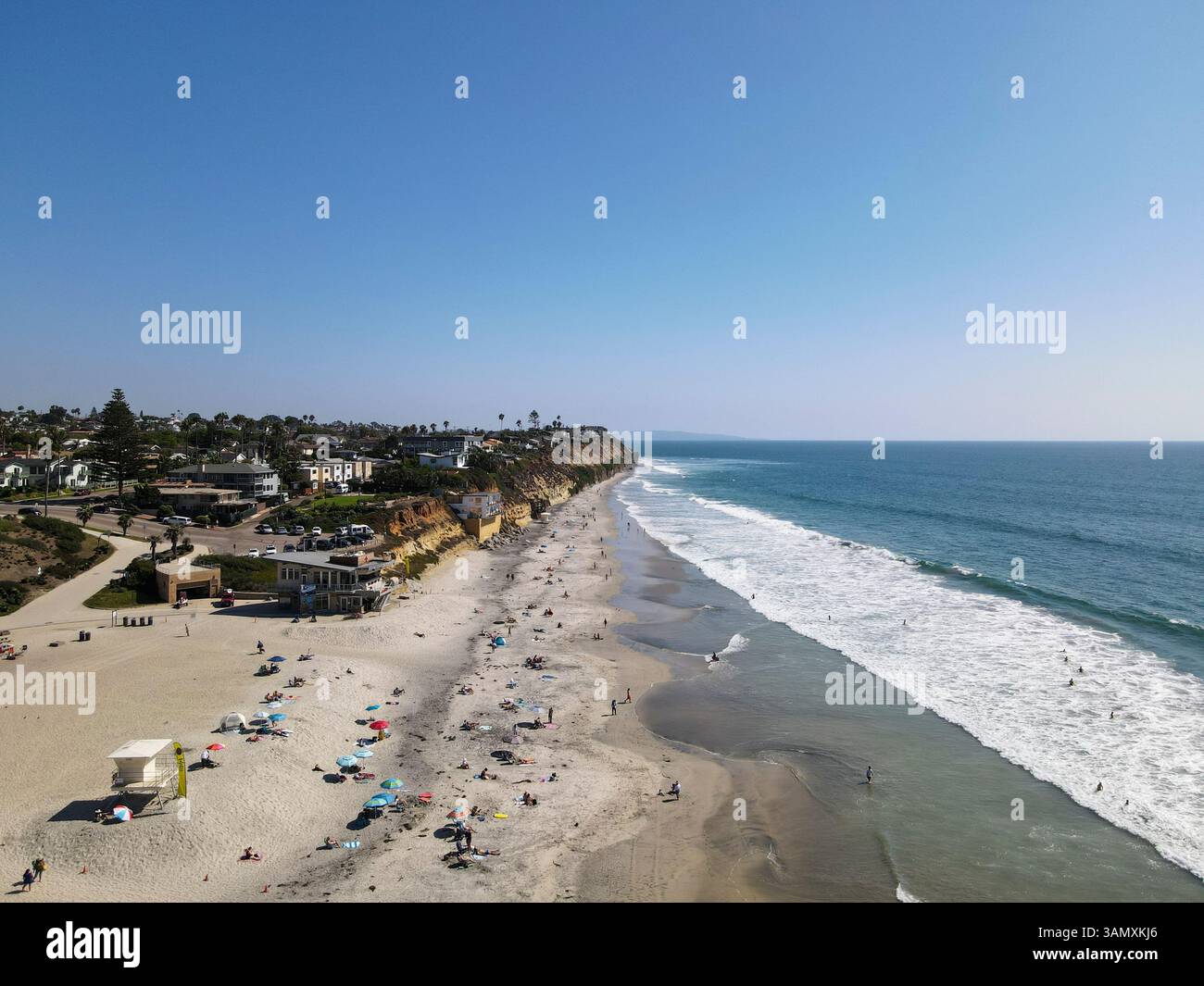 Aerial view of beautiful Moonlight Beach with sandy shore and cliffs ...