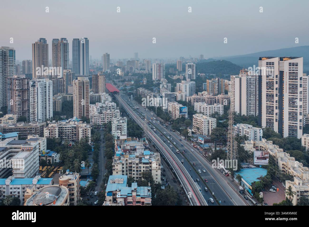 Aerial view of modern Mumbai skyline with busy highway and traffic ...