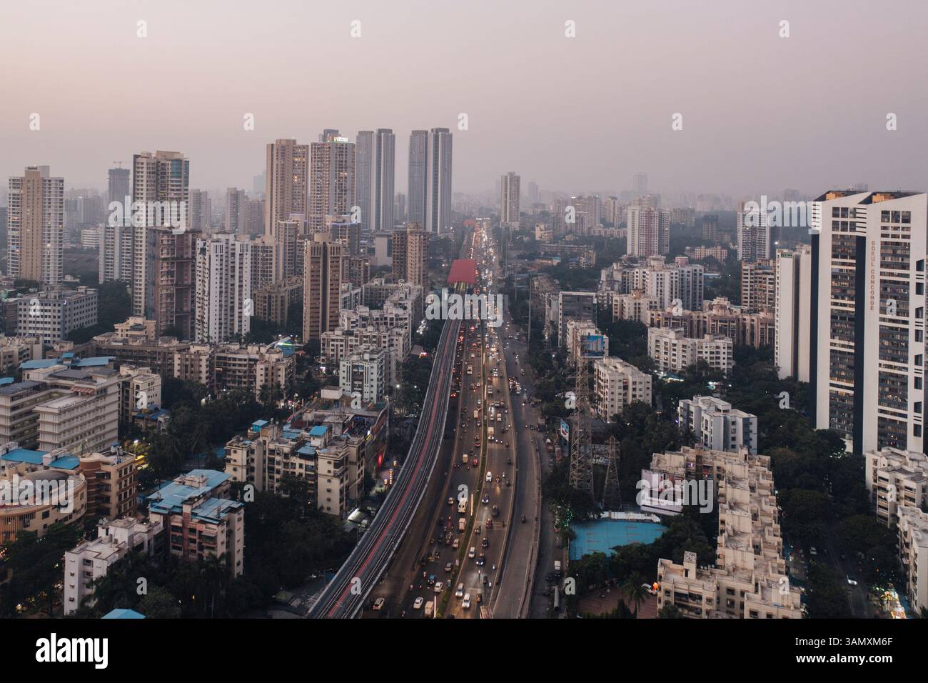 Aerial view of busy Mumbai cityscape with skyscrapers and highway ...