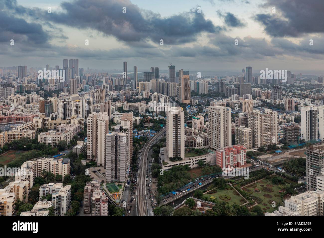 Aerial view of crowded and dense Mumbai skyline at sunset, Borivali ...