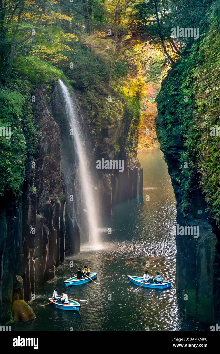 Aerial view of takachiho gorge with serene waterfalls, lush greenery ...