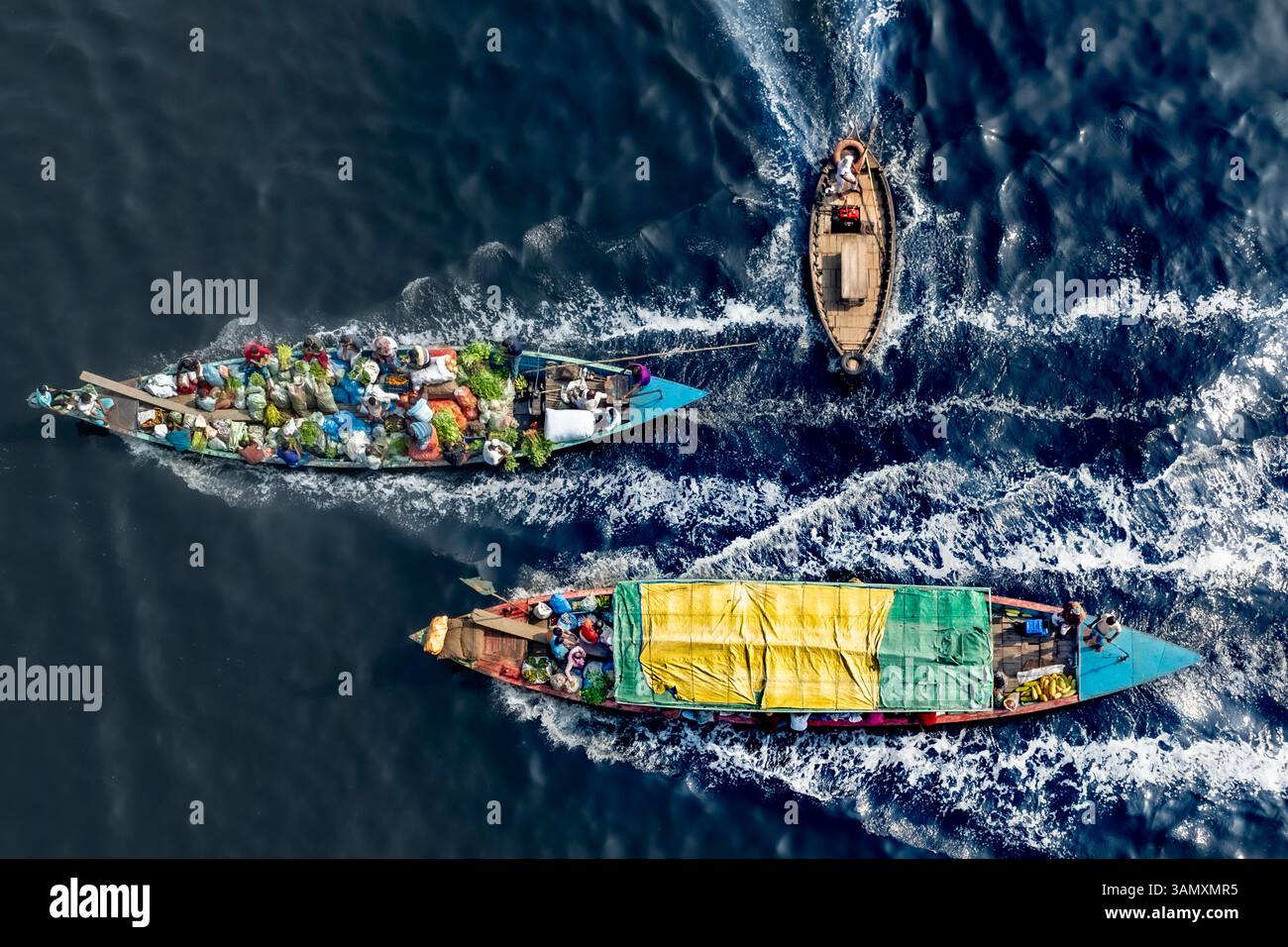 Aerial view of busy buriganga river with cargo ships and boats ...
