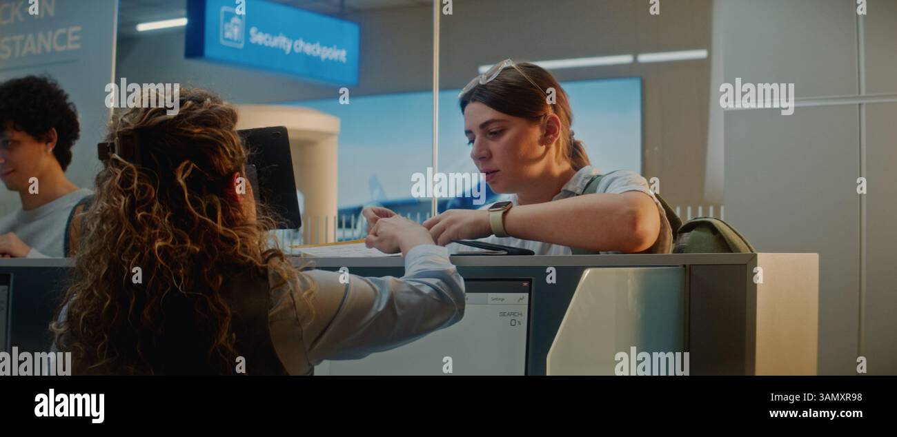 Queue of Multiethnic Passengers at Airport Check-in Counter: Female ...