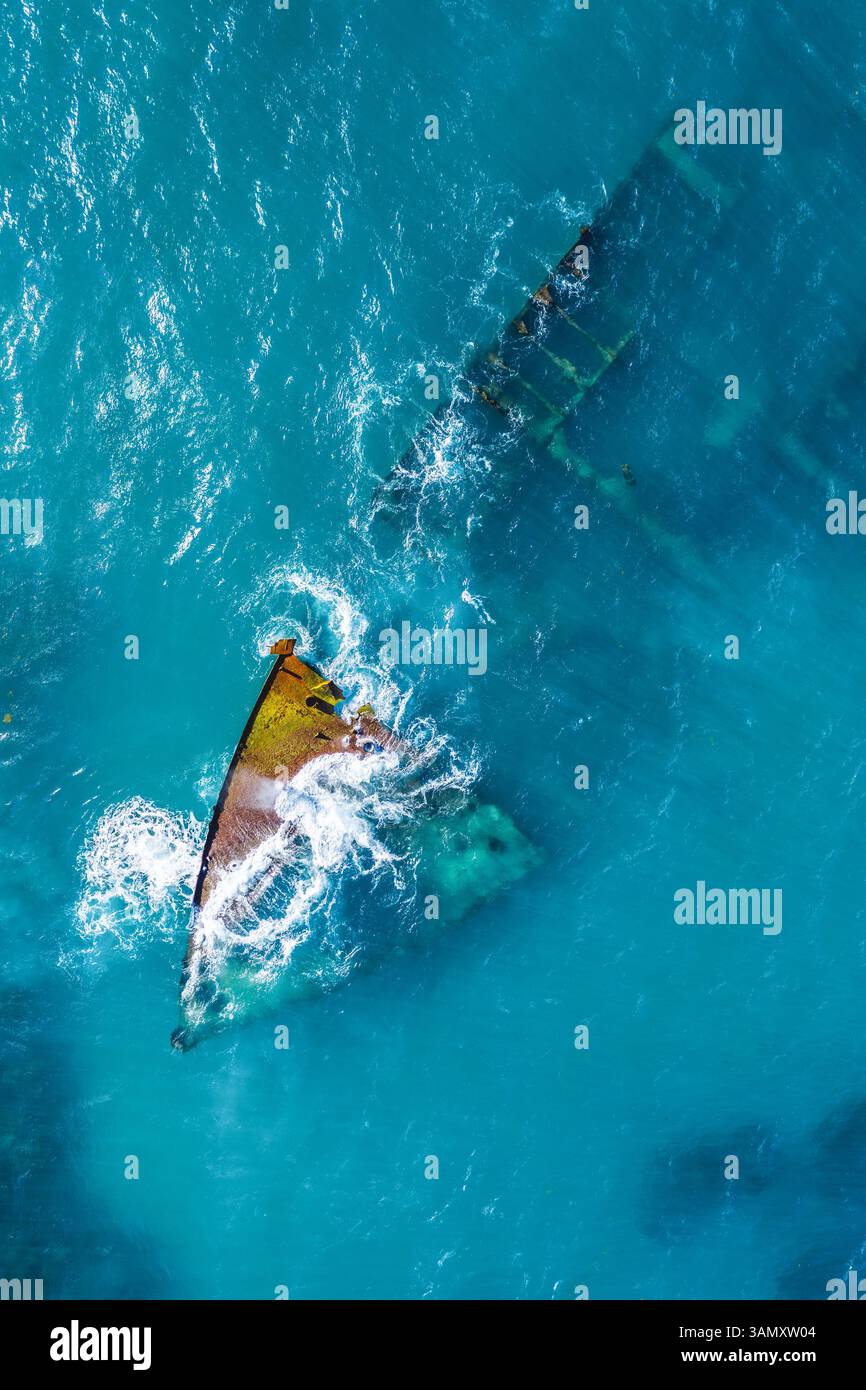 Aerial view of a sunken and abandoned ship near "Arena Gorda" beach ...