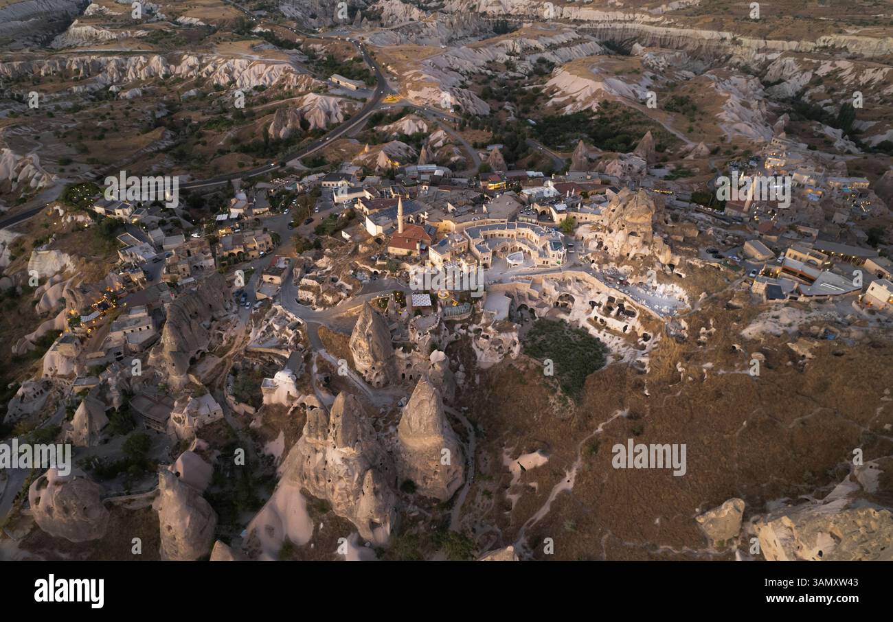 Aerial view of unique fairy chimneys and picturesque village amidst ...