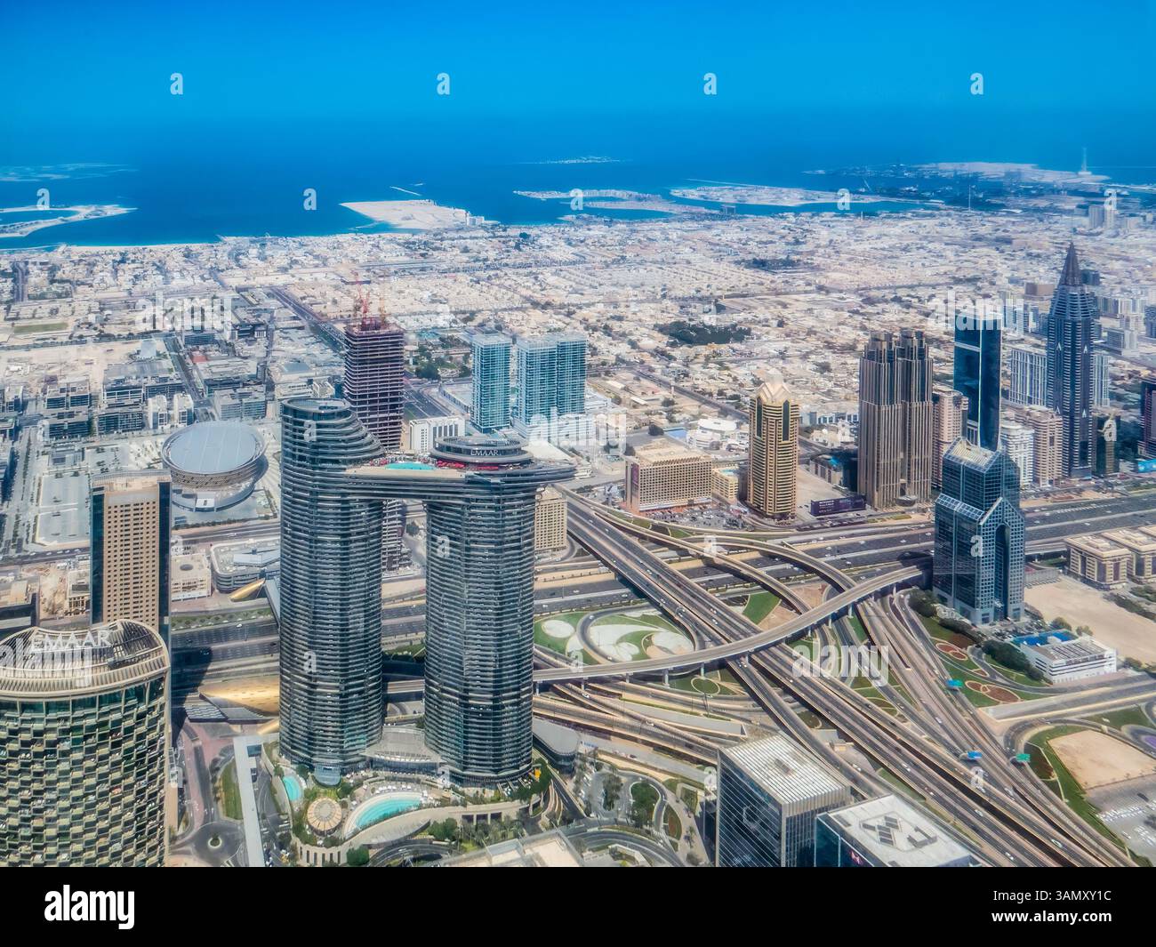 DUBAI, UAE. Aerial view over skyscrapers and busy road junction from ...