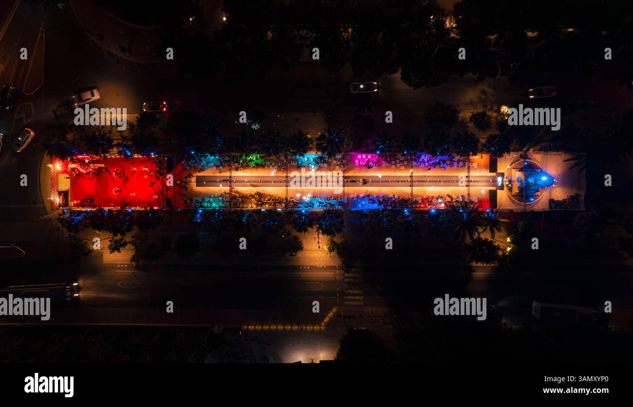 Aerial view of people on the stage at night in Valletta downtown, Malta ...
