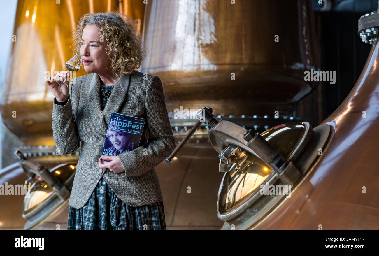 Hippfest Director Alison Strauss samples a dram of whisky at Rosebank ...