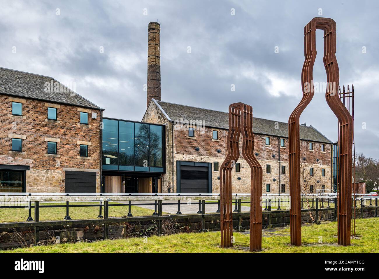 Steel sculptures of whisky bottles at restored Rosebank whisky ...