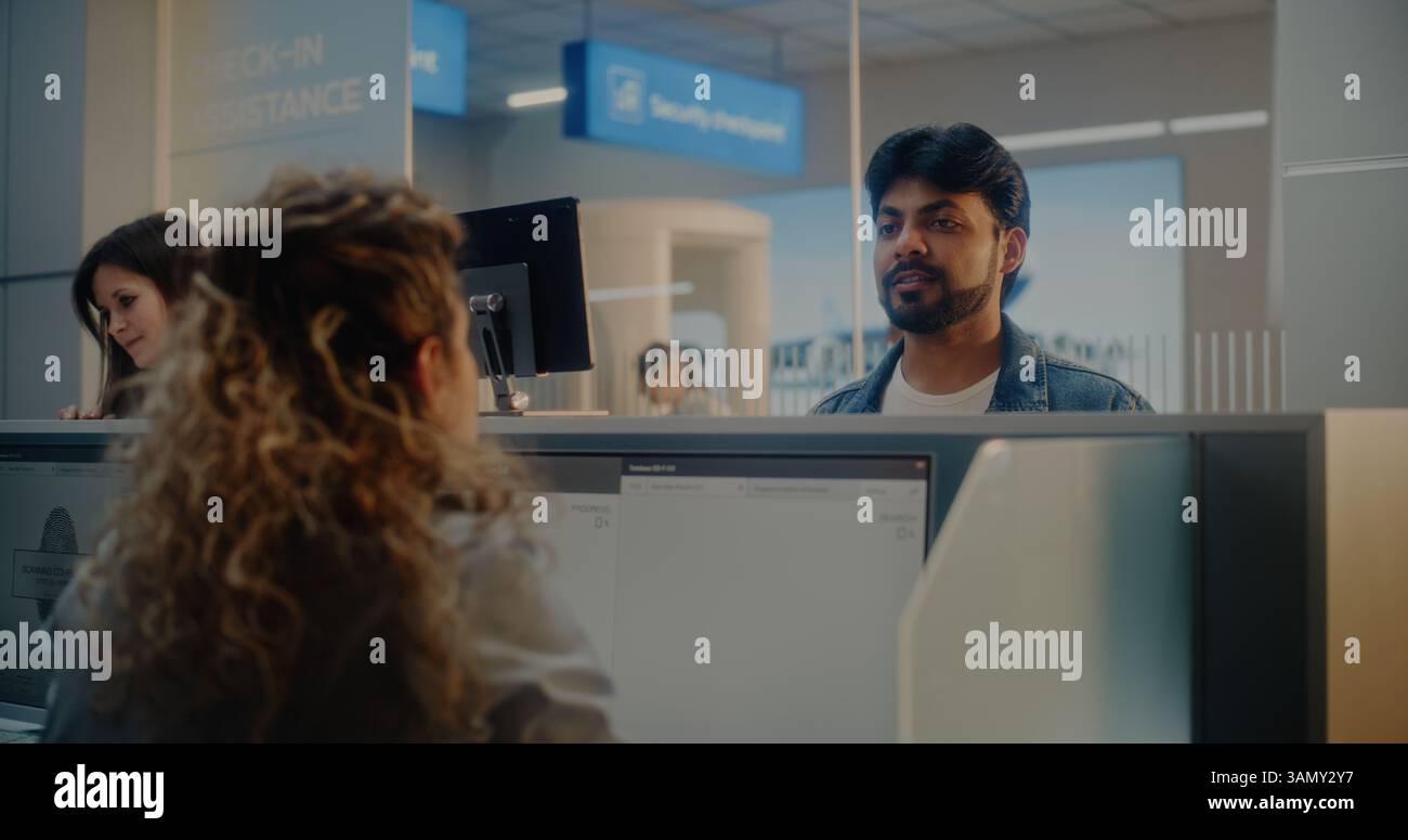 Indian man giving passport hi-res stock photography and images - Alamy