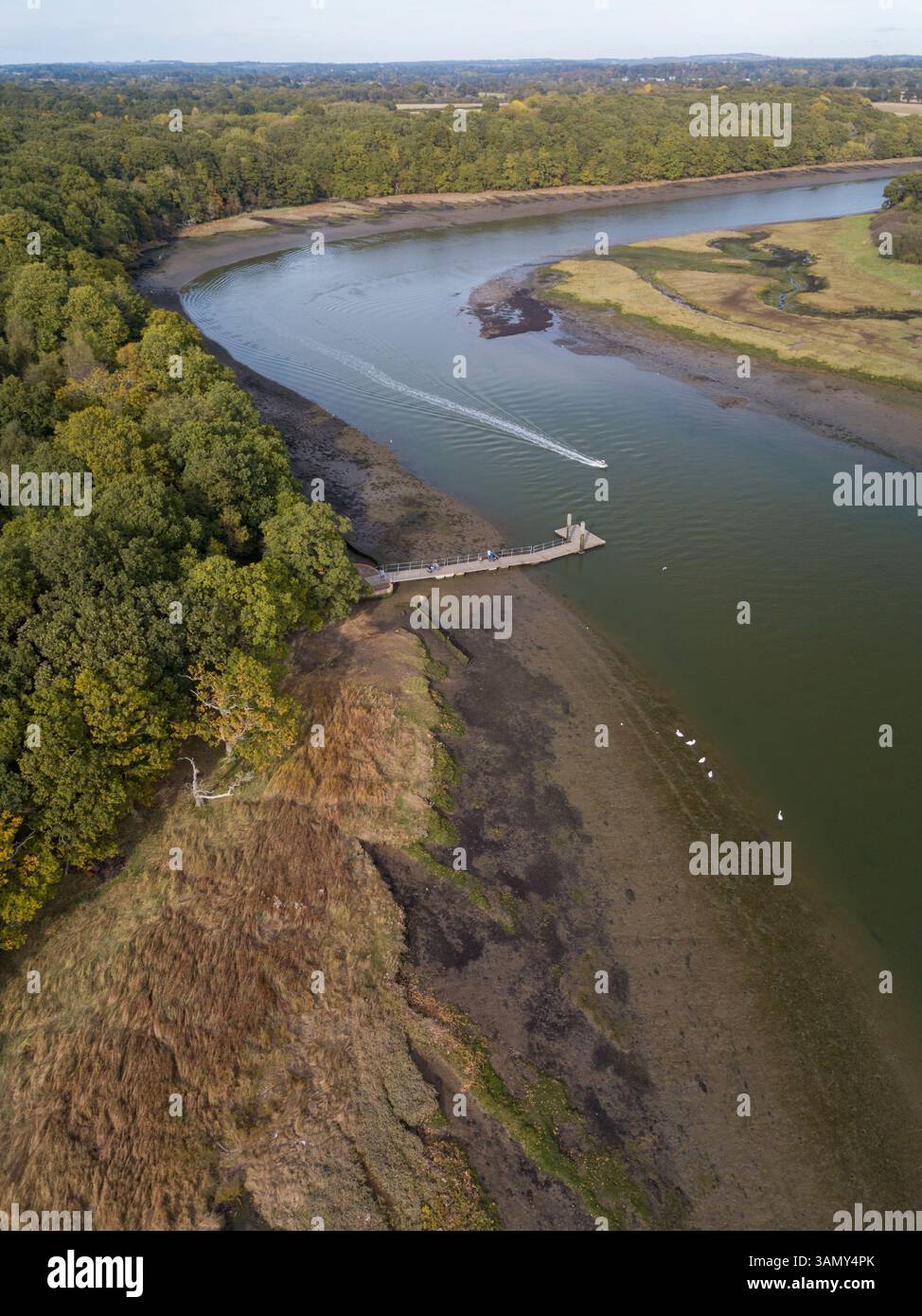 Aerial view of a boat sailing the River Hamble, Hamble, Southampton ...