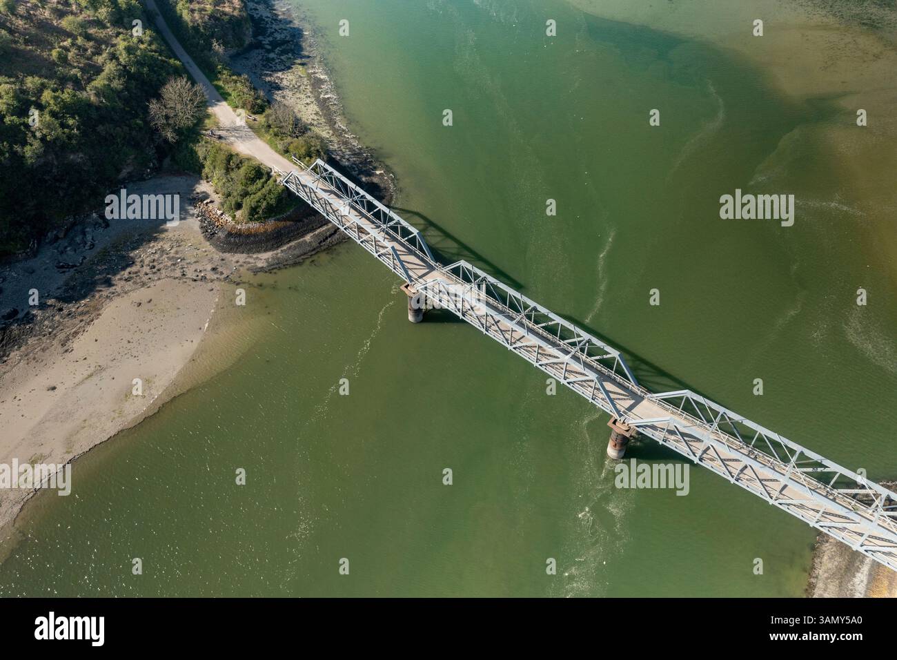Aerial view of Little Petherick Creek bridge over the Camel trail cycle ...