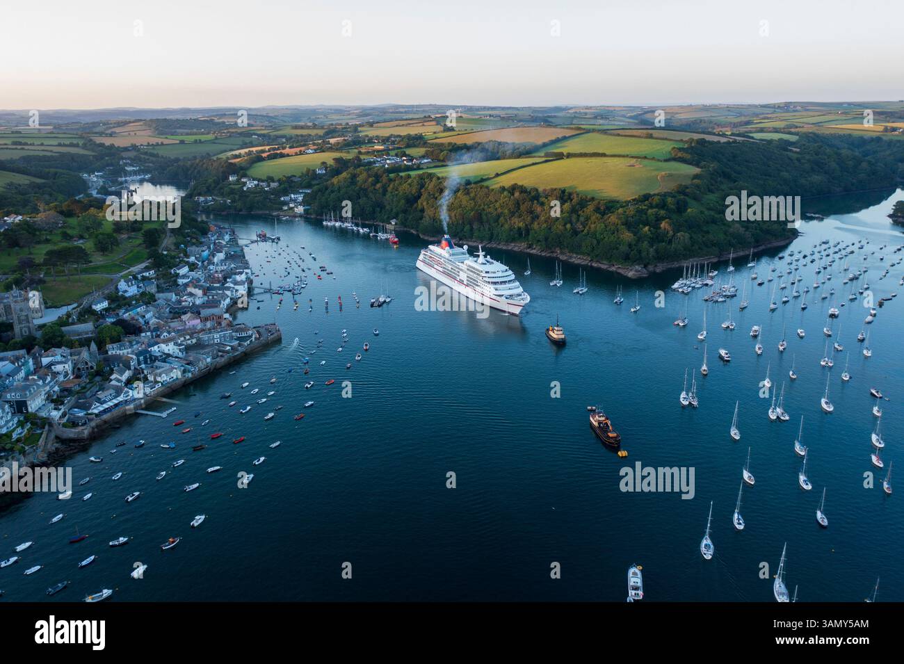 Aerial view of cruise ship leaving Fowey harbour, Cornwall, United ...