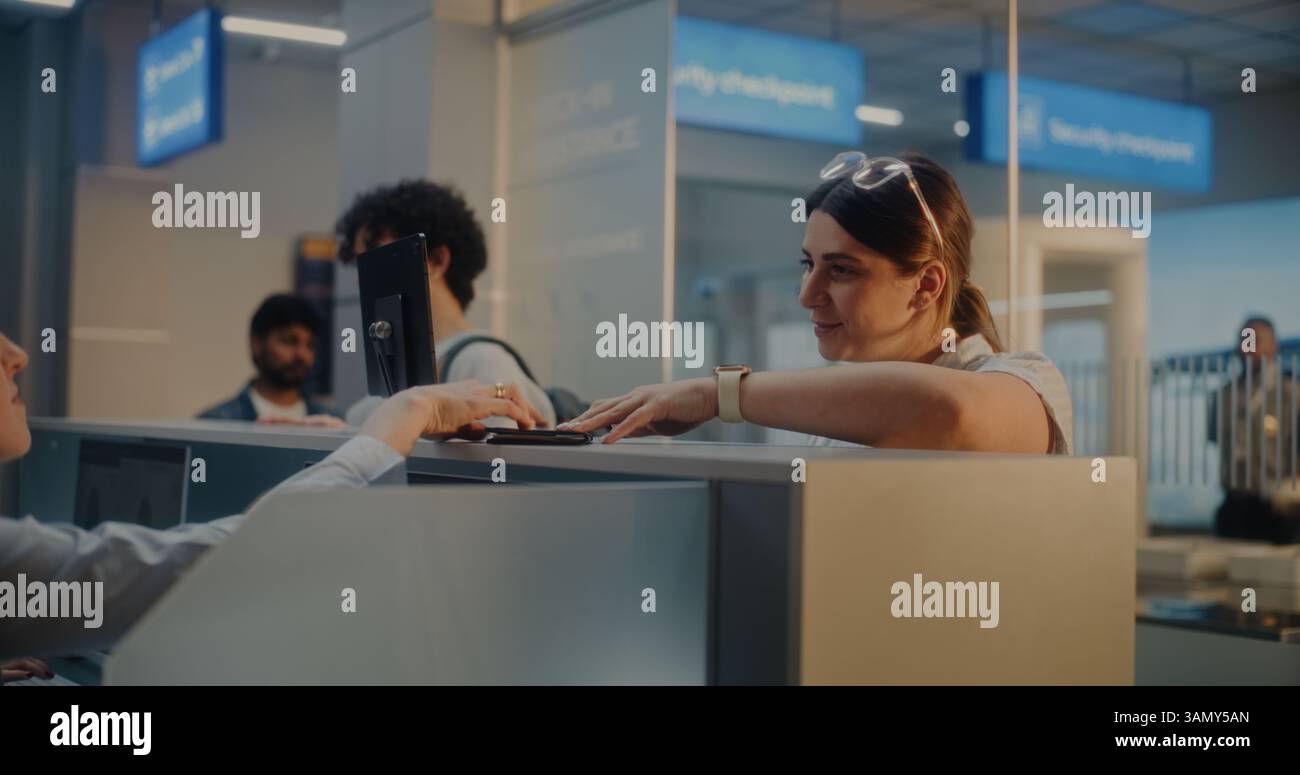 Queue of Multiethnic Passengers at Airport Check-in Counter: Female ...