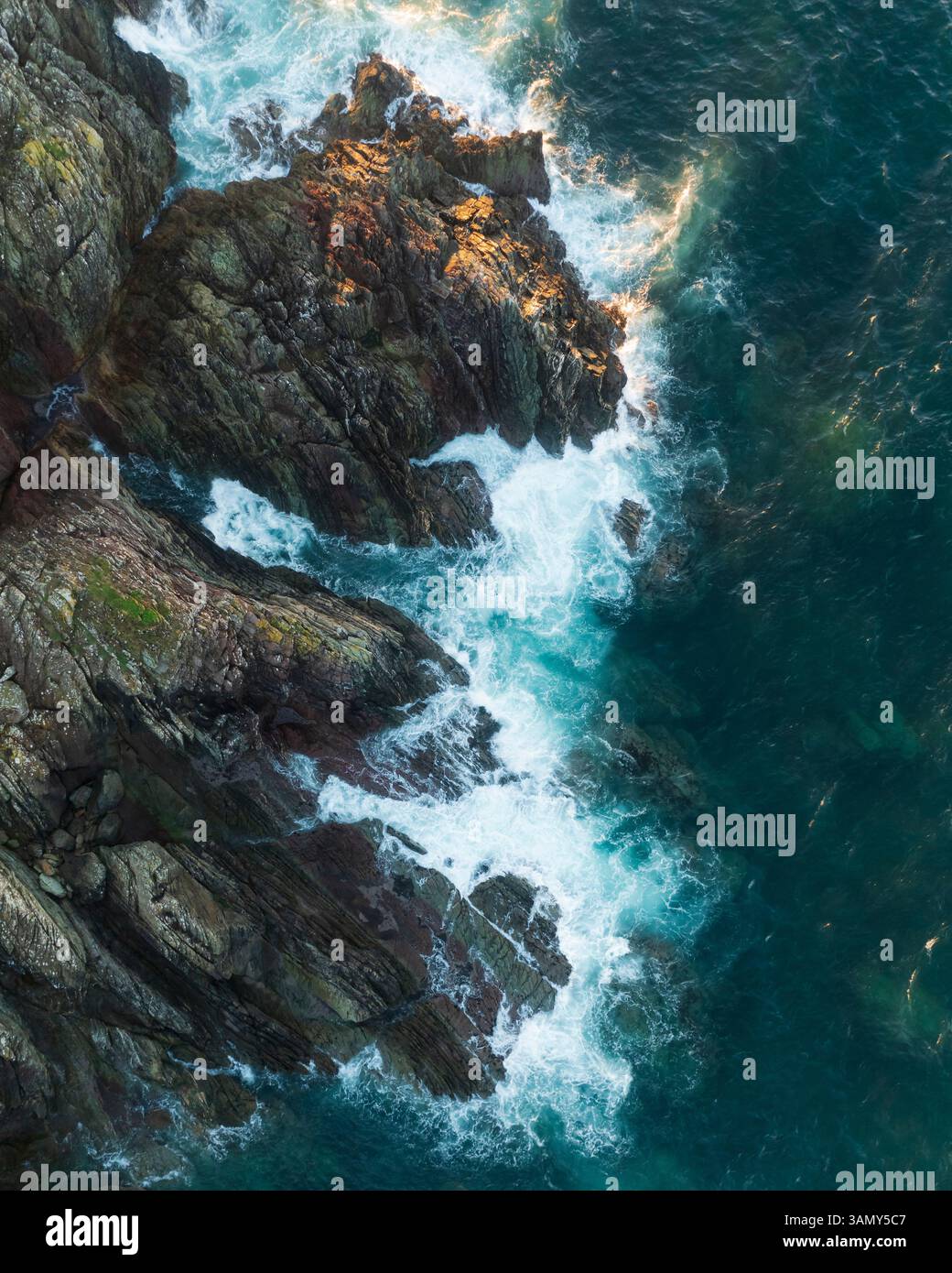 Aerial view of Polperro harbour at sunset, Cornwall, United Kingdom ...