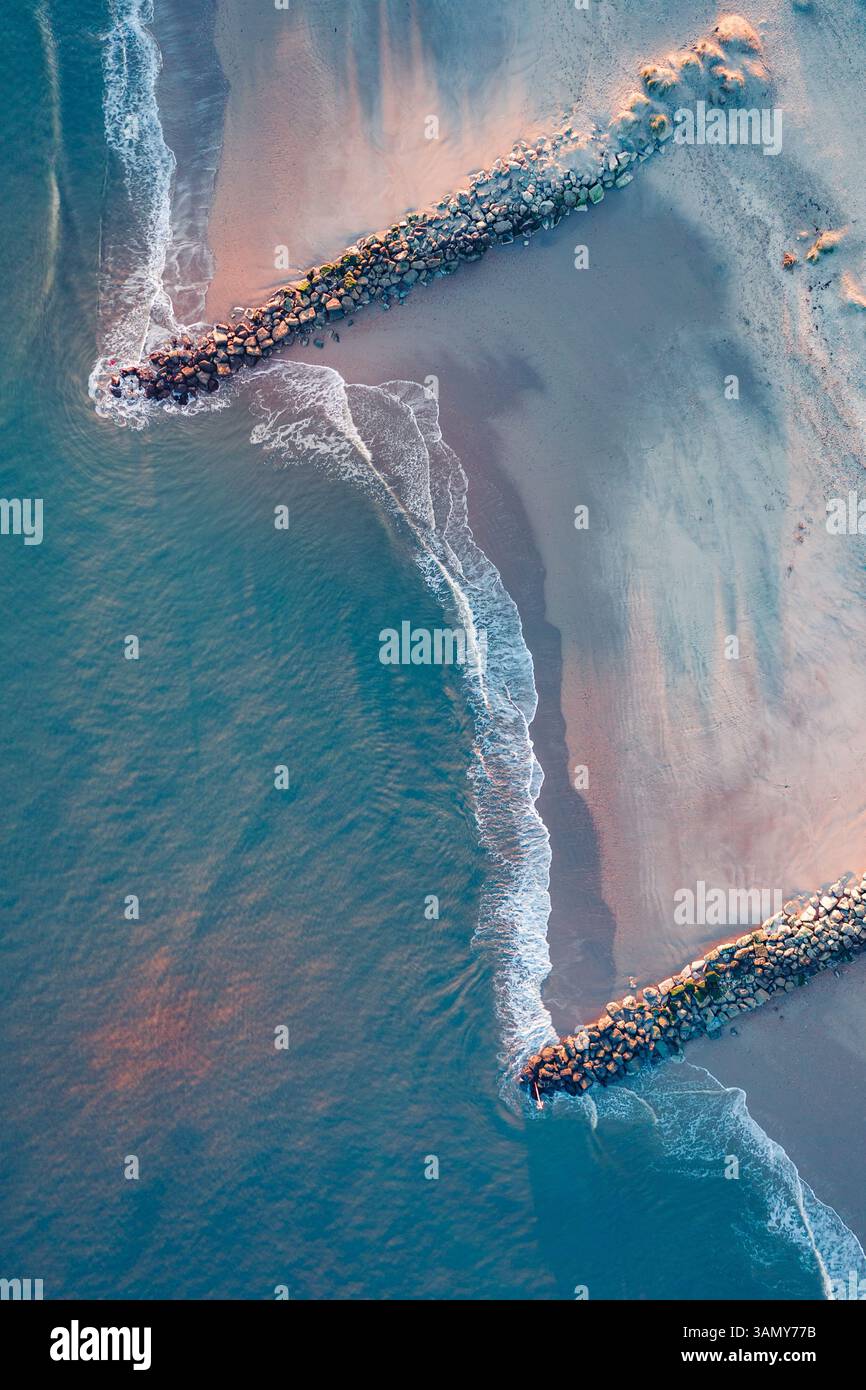 Aerial view of rocks on the beach shore at Southbourne, Bournemouth, UK ...