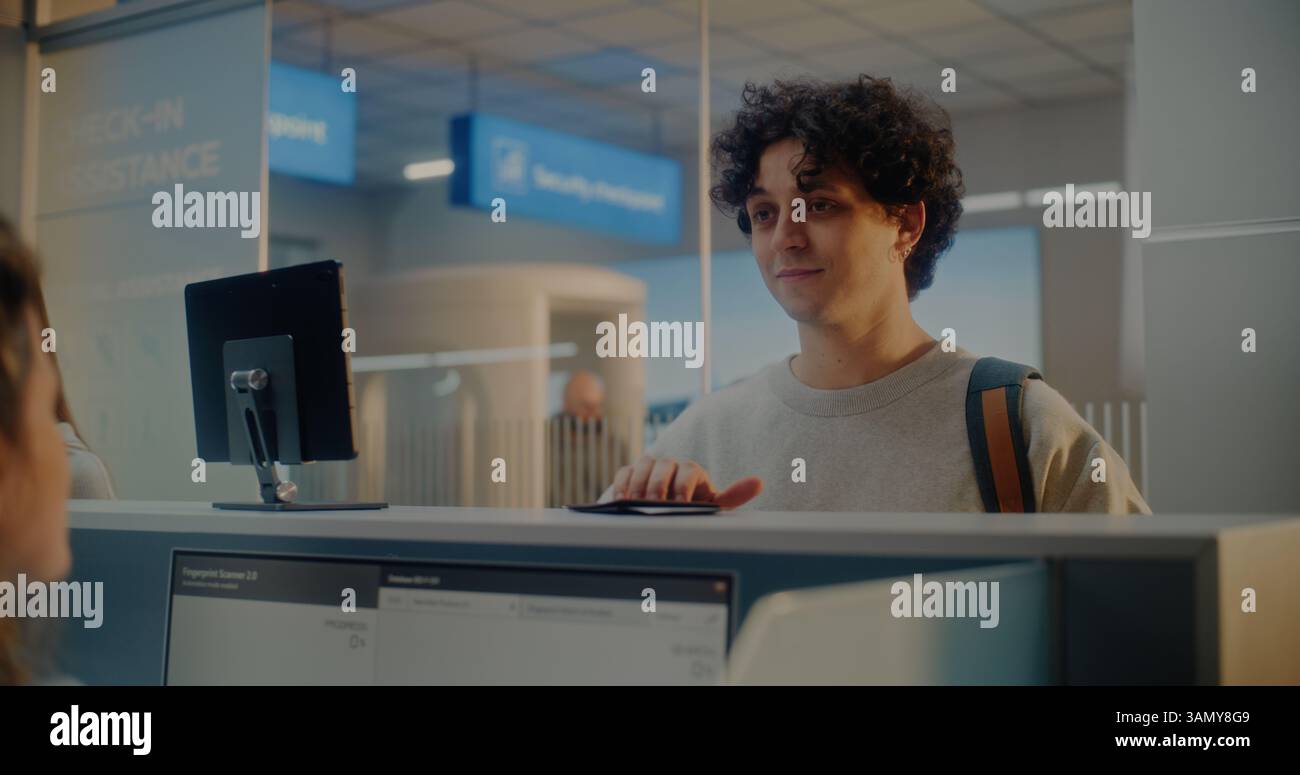 Airport Check-in Counter: Indian Man Verifying Personal ID Data by ...