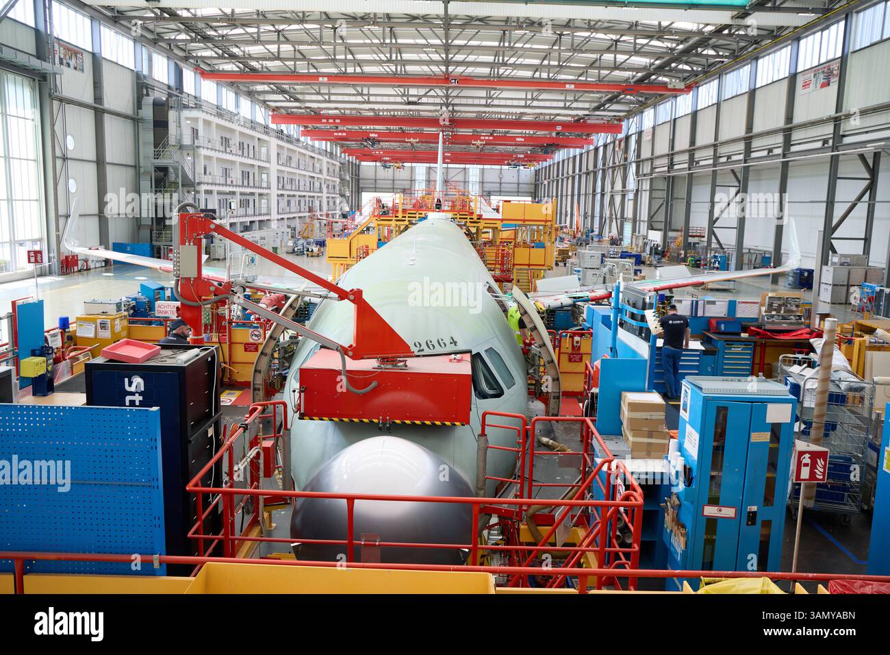 14 April 2025, Hamburg: An Airbus A321 stands in the final assembly ...