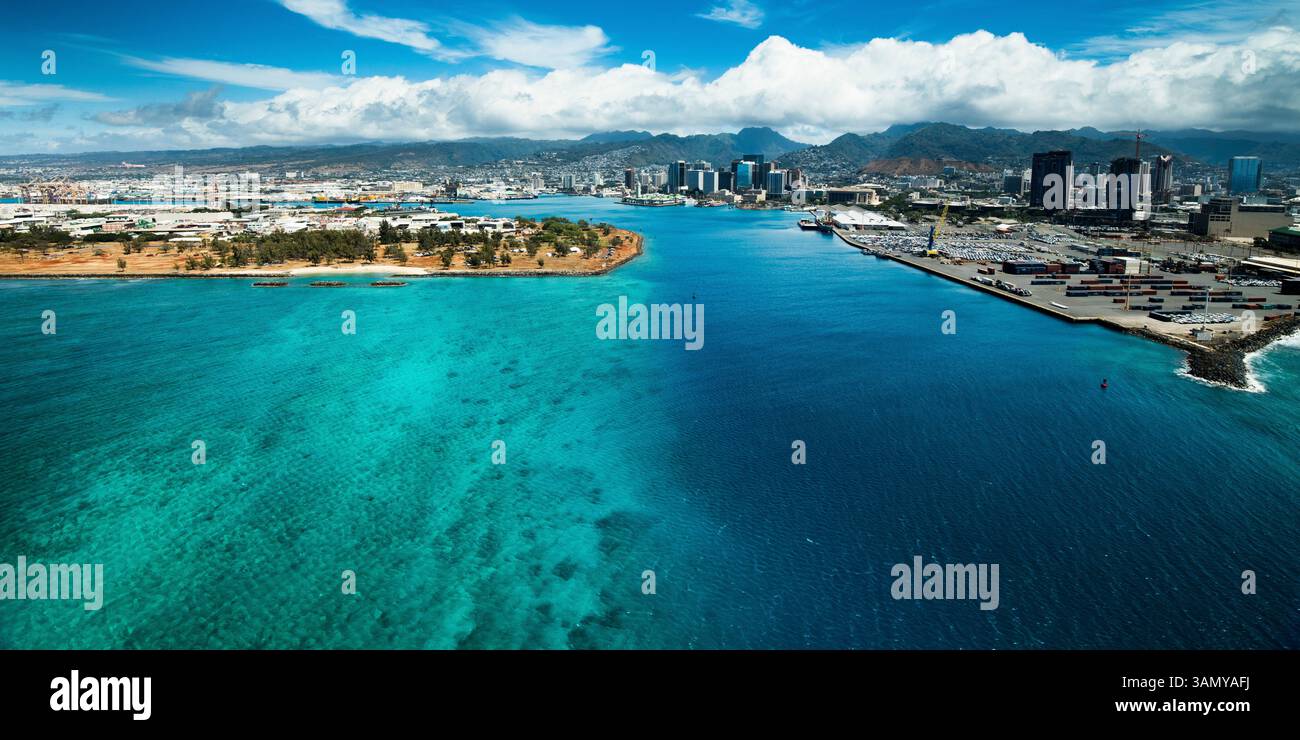 Aerial view of downtown Honolulu skyline, ocean reef, and harbor, Oahu ...
