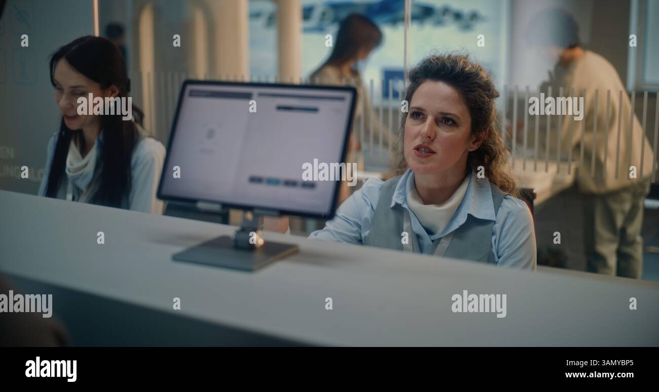 Airport Check-in Counter: Female Airline Agent Checks Passenger ...