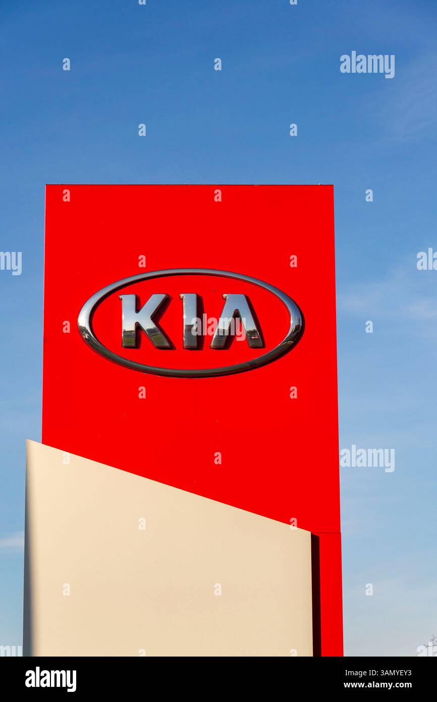 Kia motors company logo in front of dealership building on April 12 ...