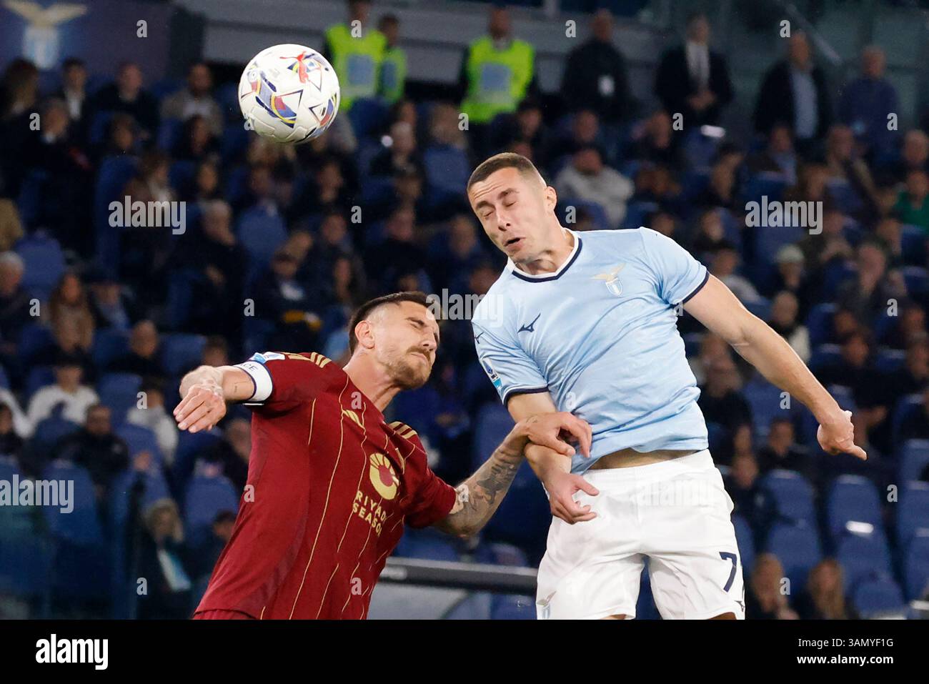 Rome, Italy. 13th Apr, 2025. Rome, Italy, April 13, 2025. Lorenzo Pellegrini, left, of Roma, and ...