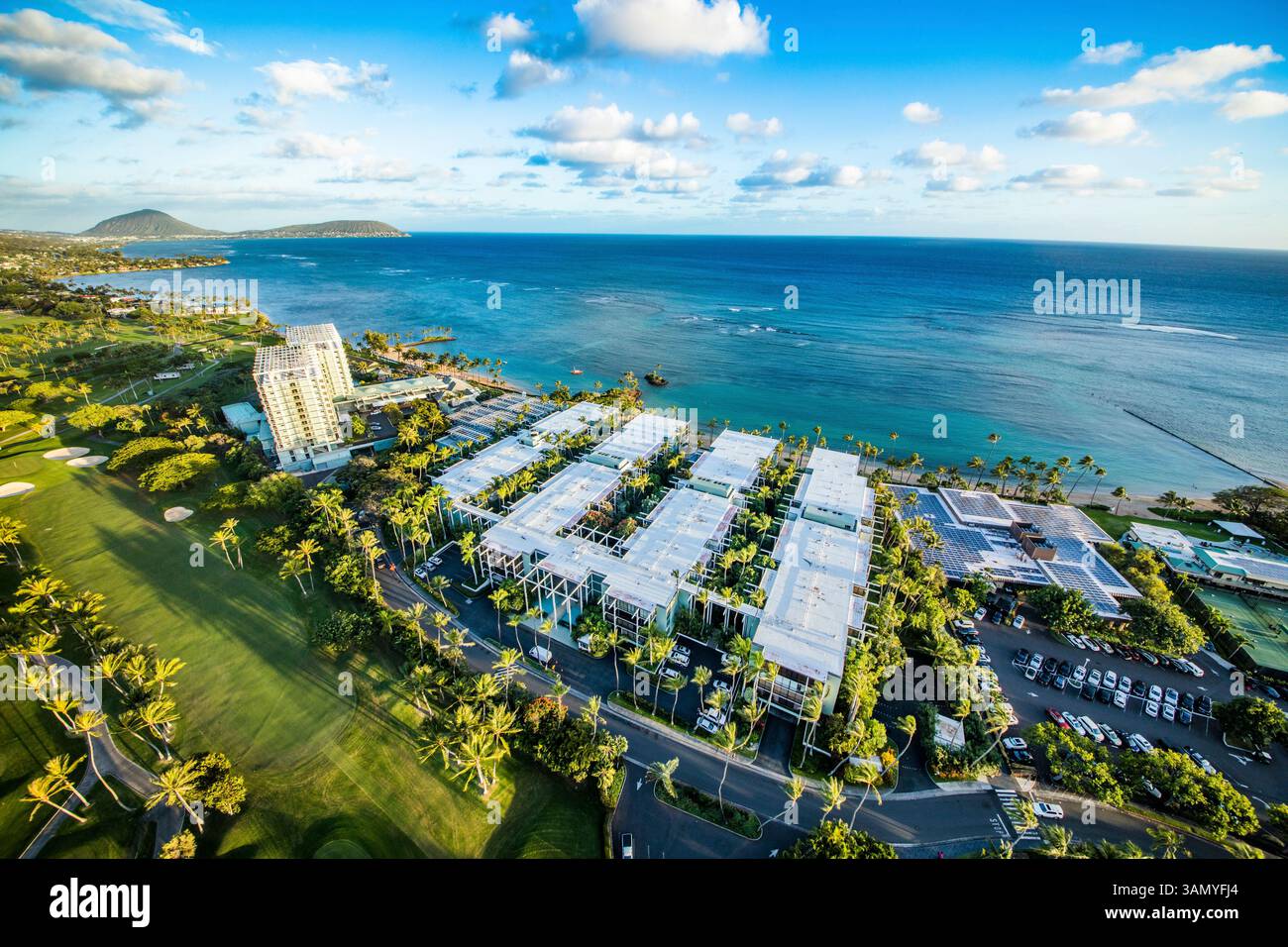 Aerial view of Kahala Beachfront Condos, parking lot, ocean, buildings ...