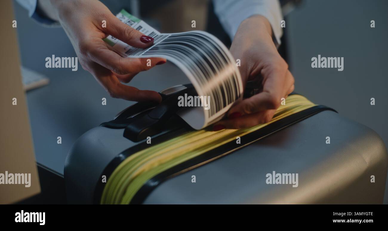 Airport Check-in Counter: Close Up of Female Airline Worker Putting ...