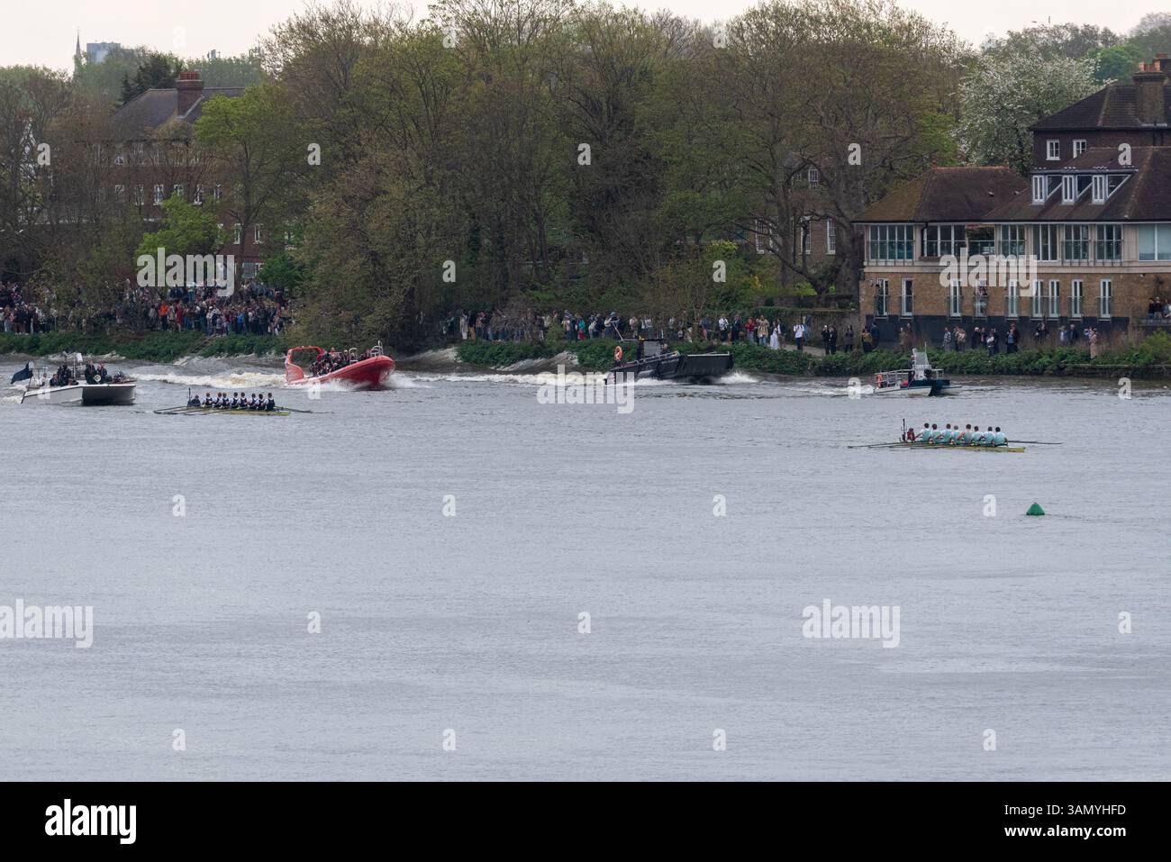University Boat Race Men's teams approach finish line with chase boats ...