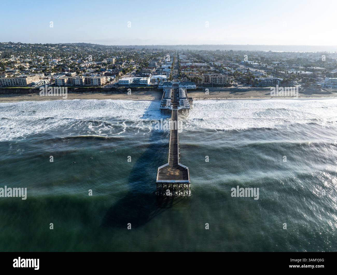 Aerial view of crystal pier and sandy beach along the pacific ocean ...