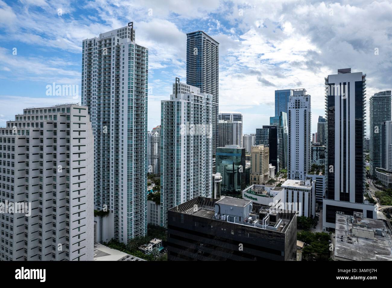 Aerial view of modern skyscrapers and buildings in a beautiful sunset ...