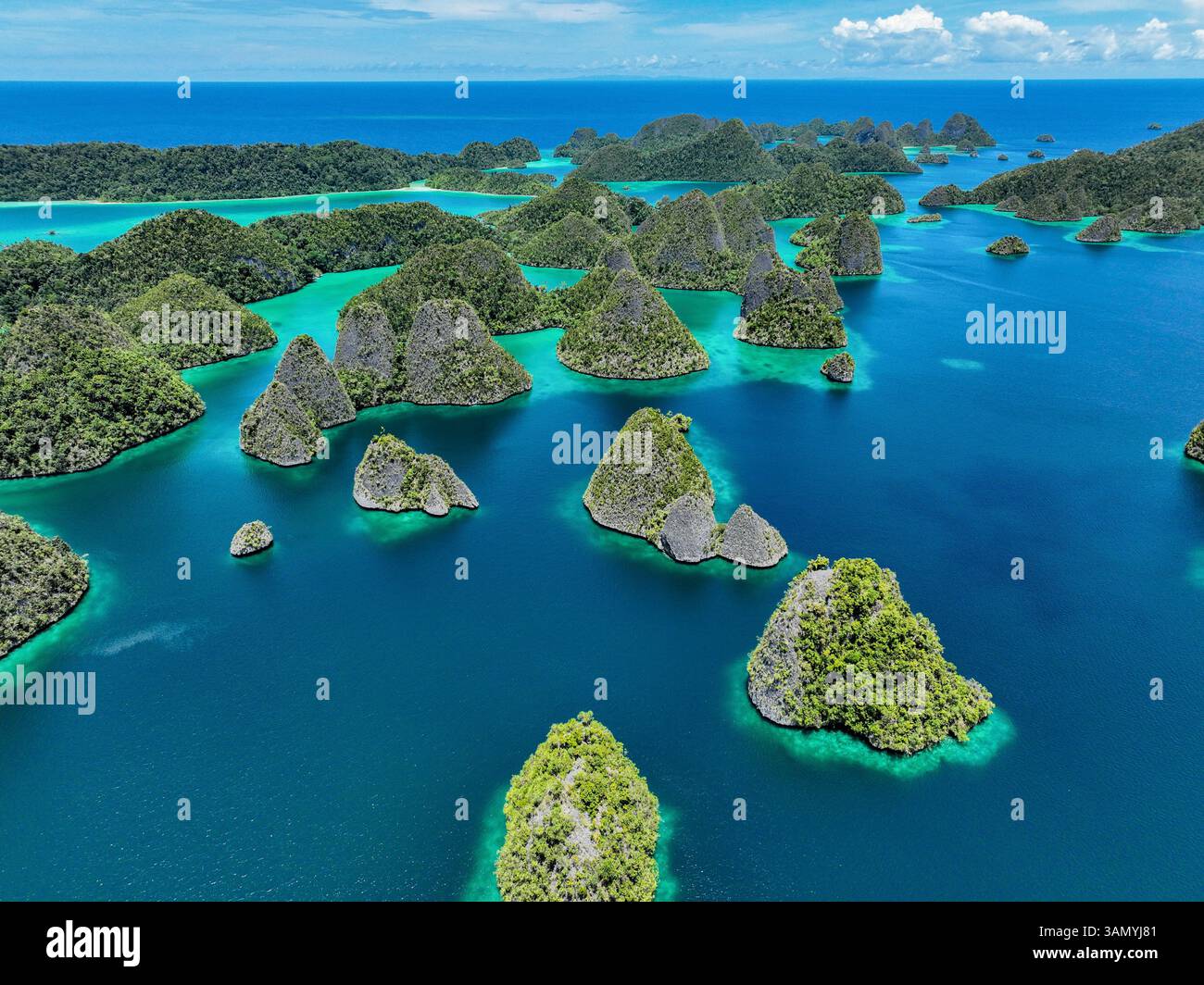 Aerial view of beautiful tropical islands and azure lagoon with ...