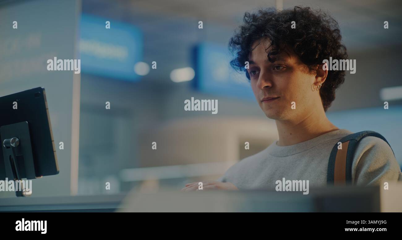 Airport Check-in Counter: Close Up of Young Man, Tourist Giving ...