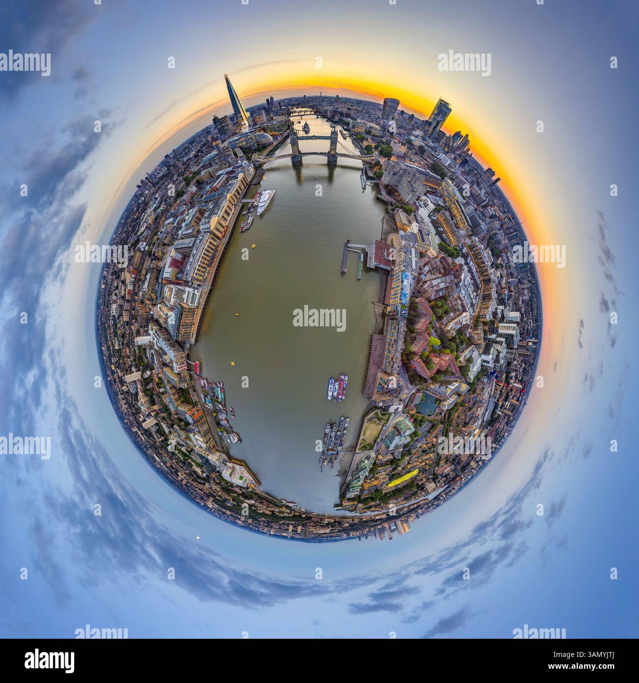 Aerial view of a tiny planet perspective of London skyline at sunset ...