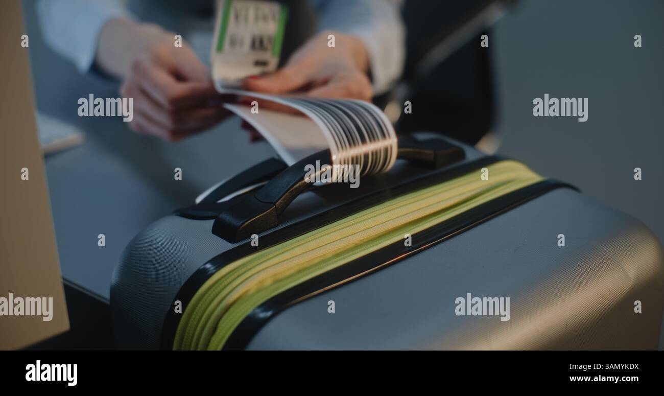 Airport Check-in Counter: Close Up of Female Airline Worker Putting ...