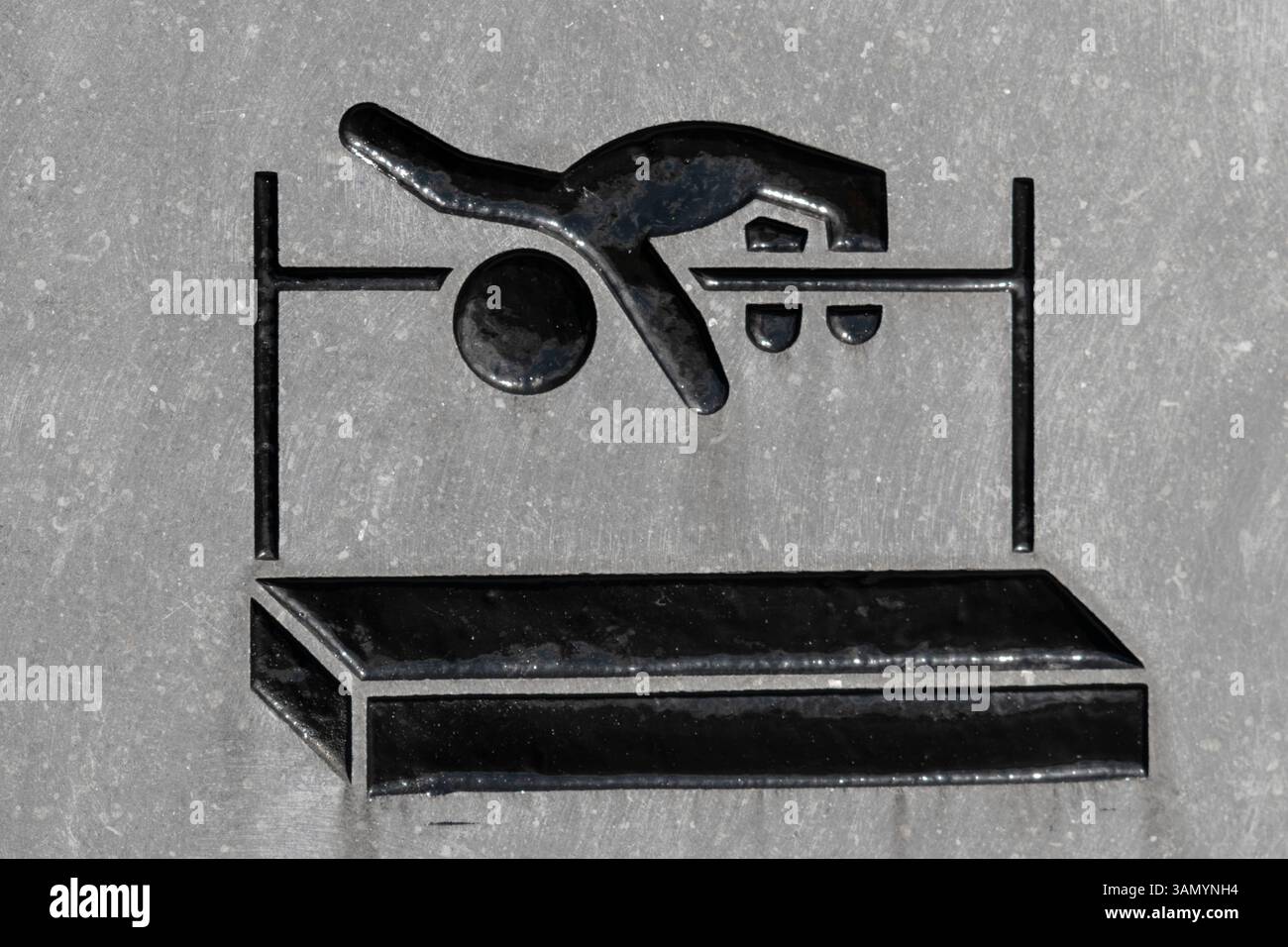 The high jump icon on grey stone background Stock Photo - Alamy