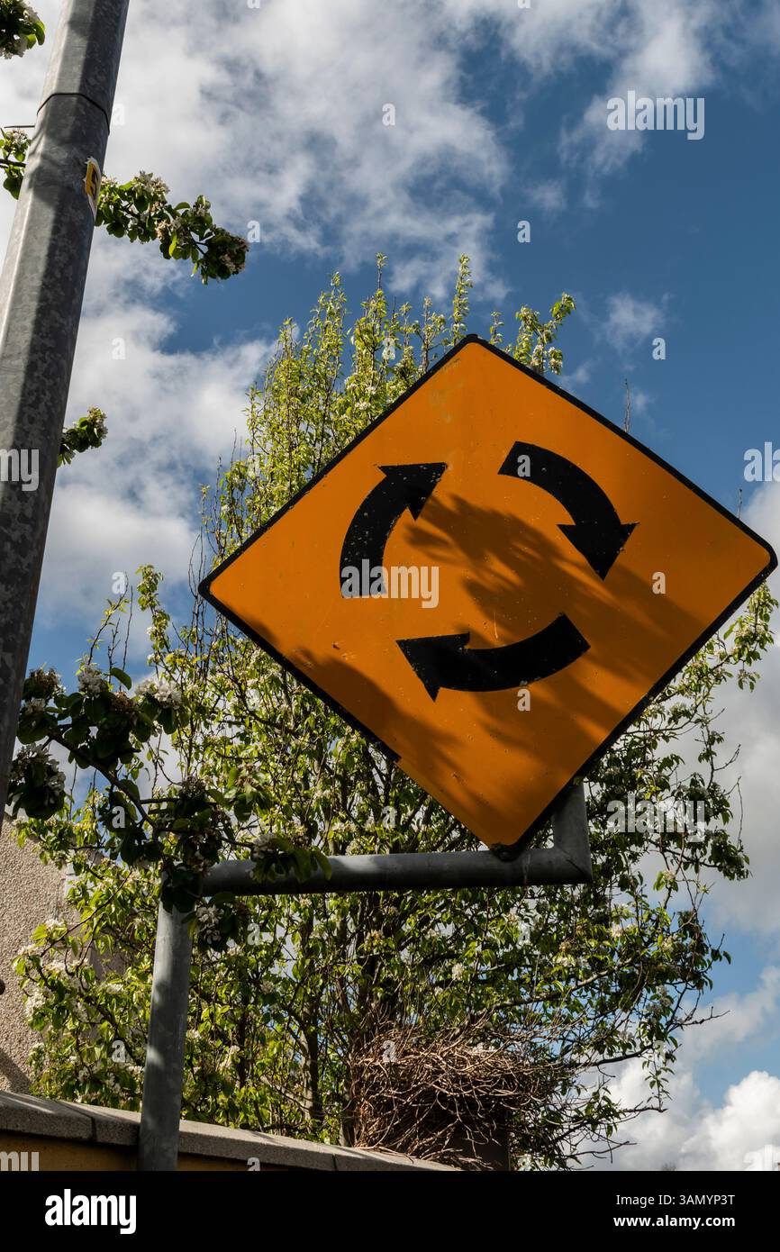 A roundabout sign in Ireland Stock Photo - Alamy
