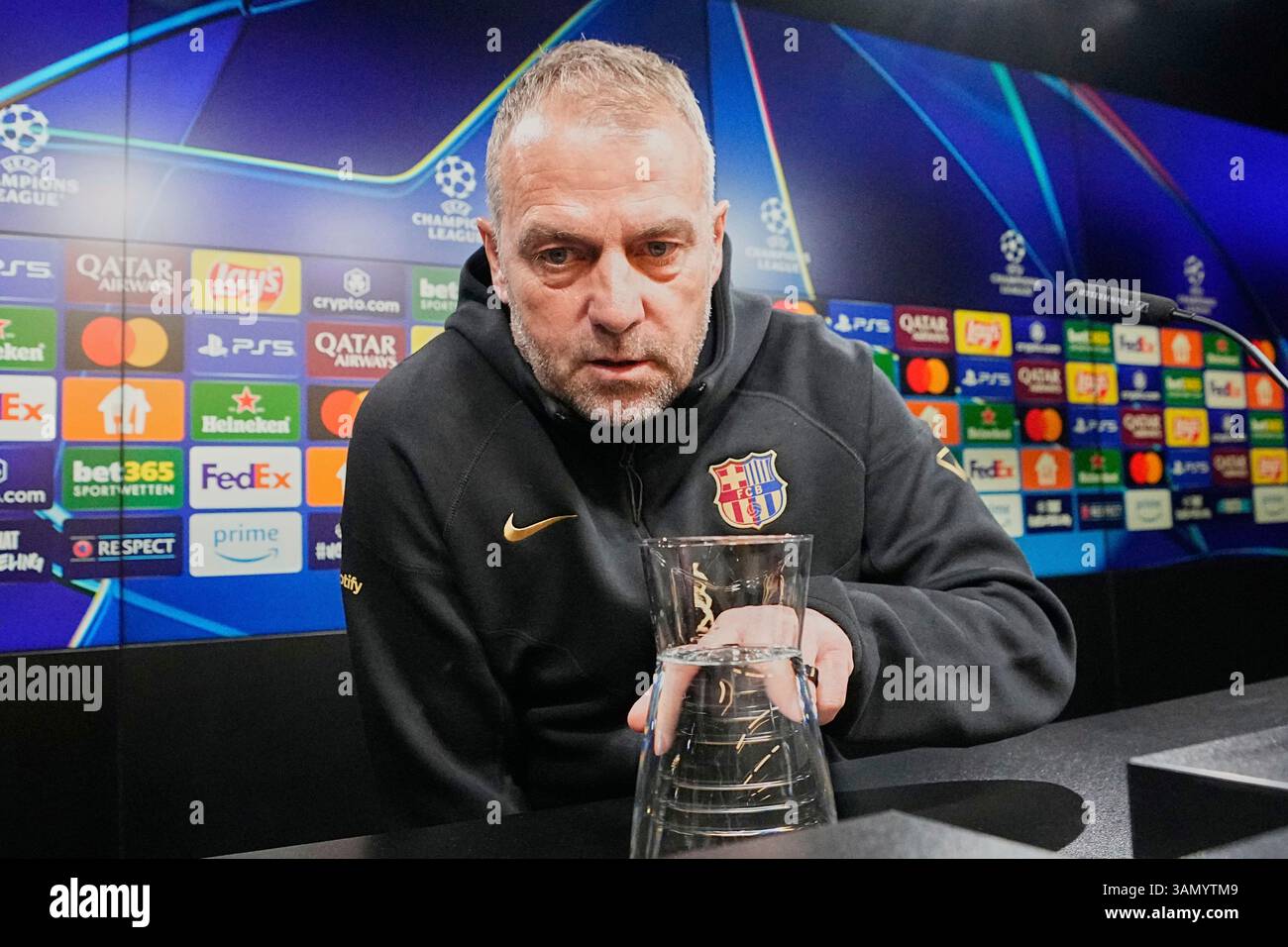 Barcelona's head coach Hansi Flick arrives at a press conference ahead ...